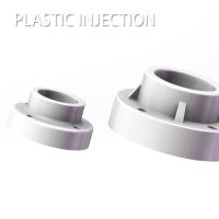 China Custom Plastic Injection Parts Gray PVC Pipe Fittings Flange Injection Molding for sale