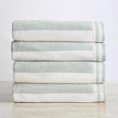 China Handcrafted 100% Cotton Velour Beach Towel 70x140cm Custom Size for Luxury Coastal Elegance for sale