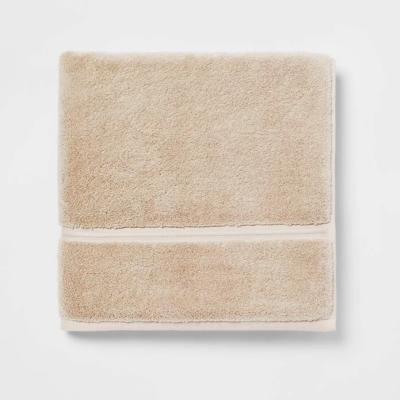 China 600gsm 100% Cotton Terry Bath Towel with Integrated Hanging Loop for Easy Drying for sale