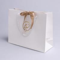 China Glitter Rose Gold Gift Bag White Gloss Custom High-end Ribbon Gift Bag for sale