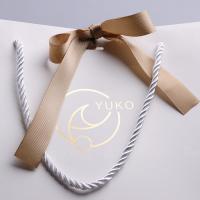 China Glitter Rose Gold Gift Bag White Gloss Custom High-end Ribbon Gift Bag for sale