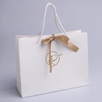 China Glitter Rose Gold Gift Bag White Gloss Custom High-end Ribbon Gift Bag for sale