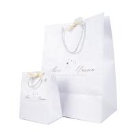 China Creatrust Custom Gift Paper Bag Handle Paper Bags Brand Logo Luxury Boutique Shopping White Kraft Paper Customized CMYK Accept for sale