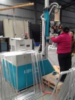 China PLC Control Desiccant Filler / Automated Filling Machine Vacuum Pump Loading for sale