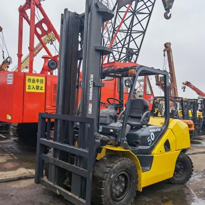 China Used Komatsu 5ton Diesel Forklift FD50-10 FD50-7 Forklift Trucks with 2 stage mast for sale