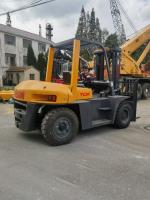 China Second Hand 7 Ton TCM Forklift FD70 Japan Made Used TCM 2.5t 3t 5t 7t in Garment Shops for sale