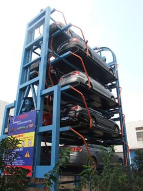 China Automatic Vertical Rotary Car Lift With Motor Chain Drive for sale