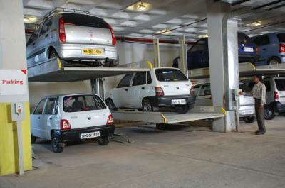 China Steel Material Puzzle Car Parking System Digital Button Swipe Operation Mode for sale