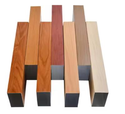 China 6063 Anodized Aluminium Wood Grain Extrusion Rectangle Tube Profile Decorative Slats Square Tube T3-T8 for sale