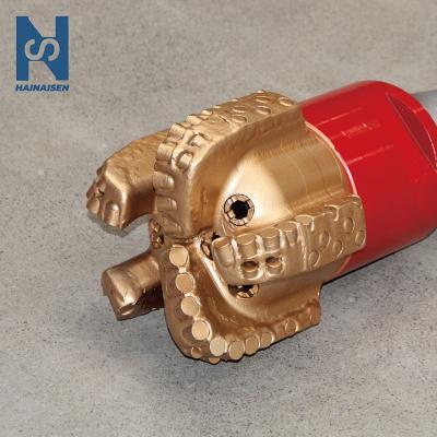 China 9 1/2in Threaded Button Bits Roller Bearing 7 Nozzle Oil Well Drill Head for sale
