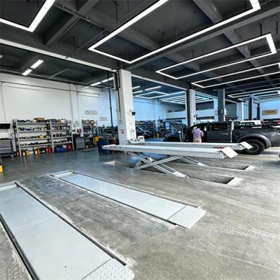 China 5 Ton Hydraulic Scissor Car Lift 5000mm Platform CE Certified 380V 220V for sale
