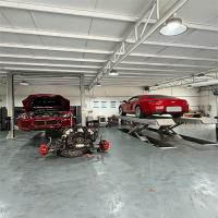China 9900lbs Car Lift with Single Point Manual Release 220V/380V for Auto Workshop for sale