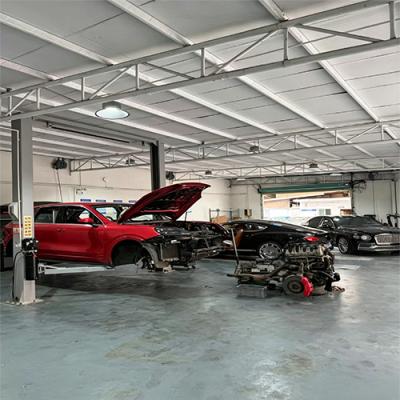 China Heavy Duty 9900lbs Car Lift Barrier Free Base Manual Release System 220V 380V Vehicle Maintenance Equipment for sale