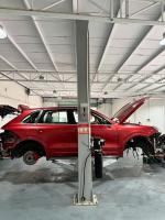 China Heavy Duty 9900lbs Car Lift Barrier Free Base Manual Release System 220V 380V Vehicle Maintenance Equipment for sale