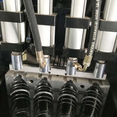 China Design 4 Cavity Semi Automatic PET Bottle Blowing Machine for Max. Bottle Height 5000mm for sale