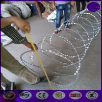 China 700mm Diameter 5 Clips BTO-30 stainless steel cross  type Concertina Razor Barbed Wire for sale