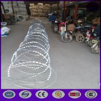 China 700mm Diameter 5 Clips BTO-30 stainless steel cross  type Concertina Razor Barbed Wire for sale