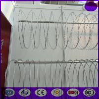 China 700mm Diameter 5 Clips BTO-30 stainless steel cross  type Concertina Razor Barbed Wire for sale