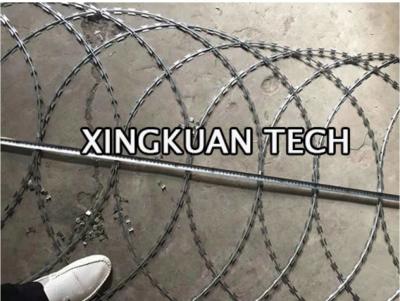 China 20cm space Flat Wrap Razor Wire 900mm Coil Diameter for fence for sale