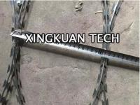 China 20cm space Flat Wrap Razor Wire 900mm Coil Diameter for fence for sale