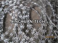 China Flat Wrap Razor Barbed Wire 500mmx15m Fitted To Welded Mesh Fence for sale