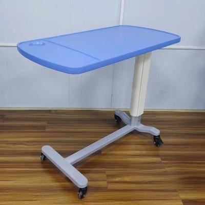 China ABS Panel Medical Overbed Table Gas Spring Lift Mobile Hospital Bed Table for sale
