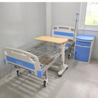 China 2-Function Stainless Steel Manual Hospital Bed With IV Pole Bedside Table & Cabinet for sale