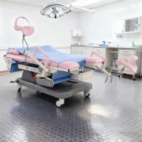 China Electric OB/GYN Exam Table 170kg Capacity with Pelvic Tilt and Waste Basin for sale