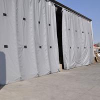 China 500-600g PVC Coated Tarpaulin Fabric Transportation Fabric Waterproof And Dust Proof Door Curtain Gray for sale