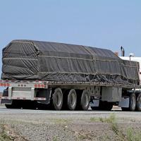 China Black Steel Tarps PVC Coated Fabric For Cargo Netting And Straps for sale