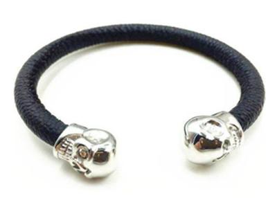 China Trendy Sports Style stainless steel Bracelet Fishskin Genuine Leather With Double Silver Plating Skull Charm Bracelet for sale