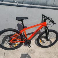 China Disc Brake sports bike featuring alloy frame handlebar built for endurance cycling and smooth control on challenging road surfaces for sale
