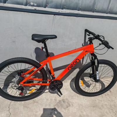 China Disc Brake sports bike featuring alloy frame handlebar built for endurance cycling and smooth control on challenging road surfaces for sale