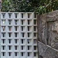 China Minimalist Square Cutout Concrete Breeze Block Cement Component Brick for Hotel Villa Garden Partition Design for sale