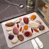 China Diatom Mud Non-Slip Bathroom Floor Mat 60cm Round Cartoon Pebble Design Kitchen Oil Absorbent for sale