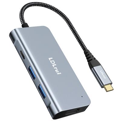 China Portable USB C Multiport Hub Compact 4 In 1 USB C Hub 4K HDMI 100W PD Charging 2 USB C 5Gbps Data Ports for sale