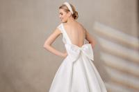 China Immaculately Plus Size Sweep Train Appliqued Lace V-neck Cap Sleeve Backless White Satin Ball Gown Wedding Dress for sale
