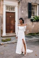 China Ultra-romantic Long Sleeve Off-the-shoulder Neckline Thigh-high Slit Sheath Sweep Train Zipper White Lace Wedding Dress for sale