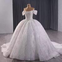 China Shiny Off-the-shoulder Beaded Puffy Empire Ball Gown Court Train White Sequins Wedding Dresses for sale