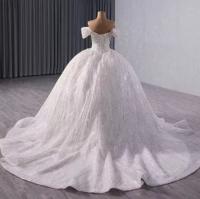 China Shiny Off-the-shoulder Beaded Puffy Empire Ball Gown Court Train White Sequins Wedding Dresses for sale