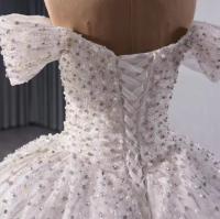 China Shiny Off-the-shoulder Beaded Puffy Empire Ball Gown Court Train White Sequins Wedding Dresses for sale
