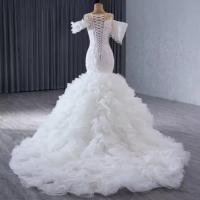 China Vintage Ruffles Boho V-neck Sleeveless Beaded Bridal Mermaid Court Train White Lace And Tulle Long Wedding Dress for sale