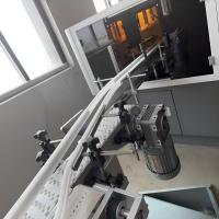 China Fully Automatic Bottling Machine with Robotic Arm and PLC Control System for High-Efficiency Packaging for sale