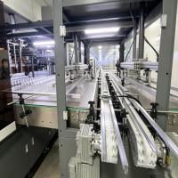 China Two-layer Packaging Machine With Two Sets of Independent Equipment For Milk Bottle Packaging for sale