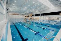 China Competition Swimming Pool 50x25x2M Zn-Al-Mg Steel Frame with 15-Year Warranty and 50-Year Service Life for sale