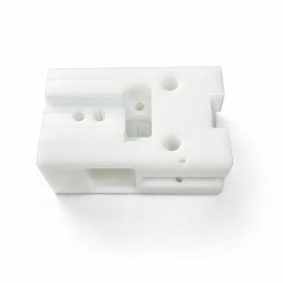 China Custom CNC Machined UHMWPE Plastic Block, High Wear Resistant Industrial Plastic Fixture for sale