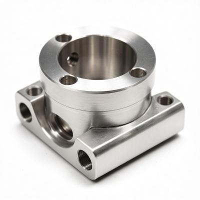 China precision CNC Machined Flange Mount Housing, Multi-Hole Stainless Steel Bracket for Robotics & Automation for sale