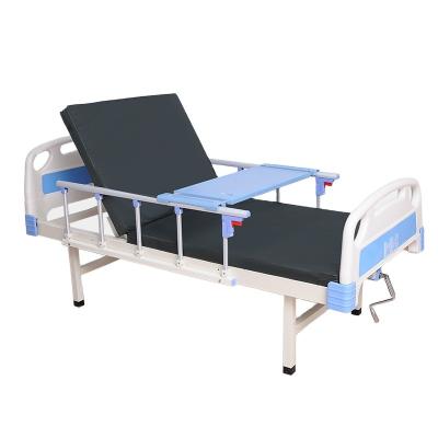China Manual Single Crank Homecare Medical Bed 2000mm Length with Dining Table Back Lifting 150kg Capacity for sale