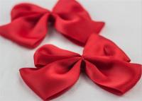 China Customized Silver Hot Stamping Logo Paper Luxury Bag With Bowknot for sale
