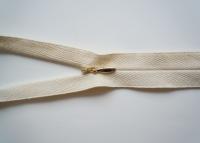 China Golden Metal Pull Custom Invisible Separating Zipper , Fabric Background Metal Separating Zipper for sale